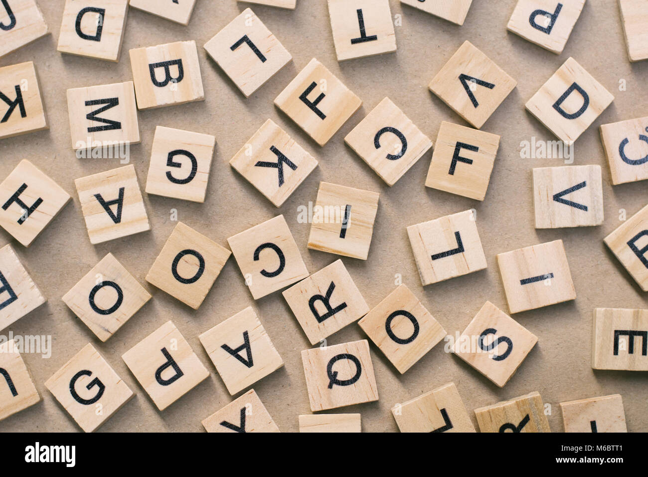 background of letterpress wood type printing blocks, random letters of ...