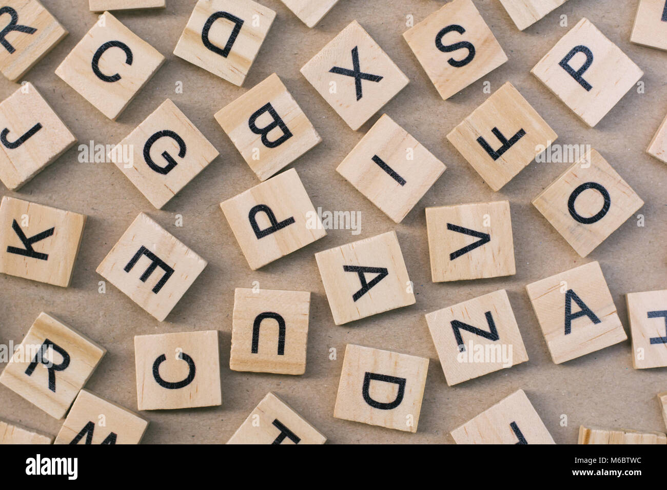 background of letterpress wood type printing blocks, random letters of ...