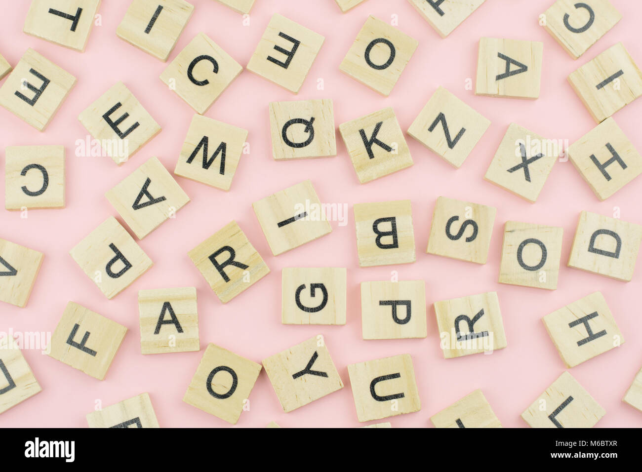 background of letterpress wood type printing blocks, random letters of ...