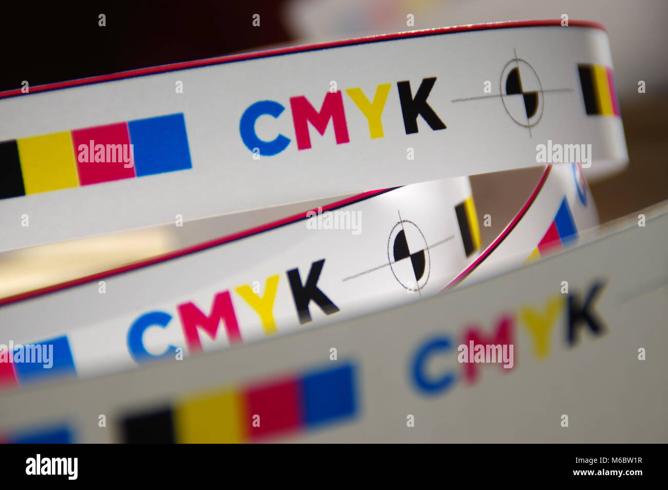 CMYK test printed on white paper. Cyan, magenta, yellow, black and ...