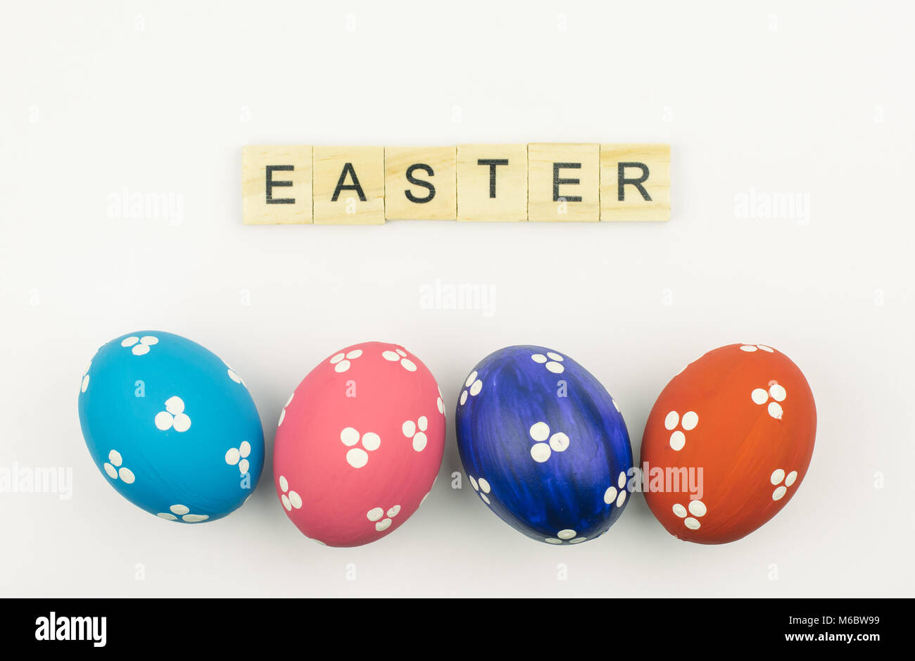 Text wooden blocks spelling the word easter on white background Stock ...