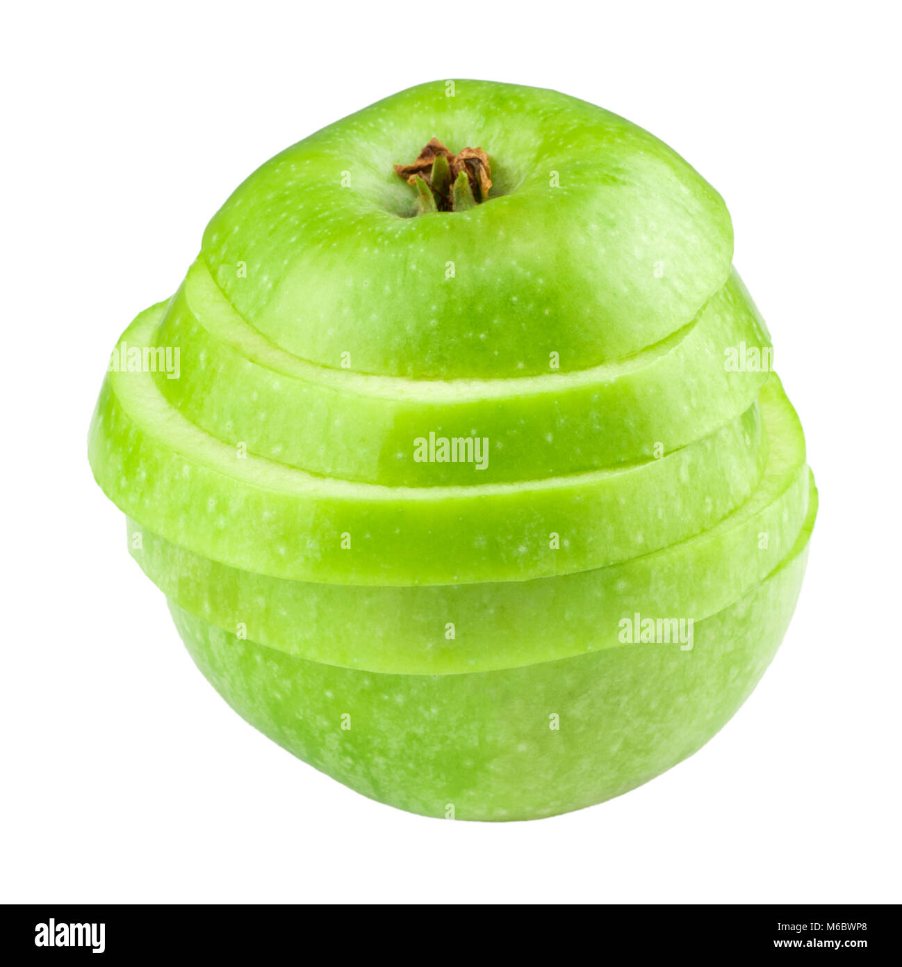 sliced green apple isolated on a white background Stock Photo - Alamy