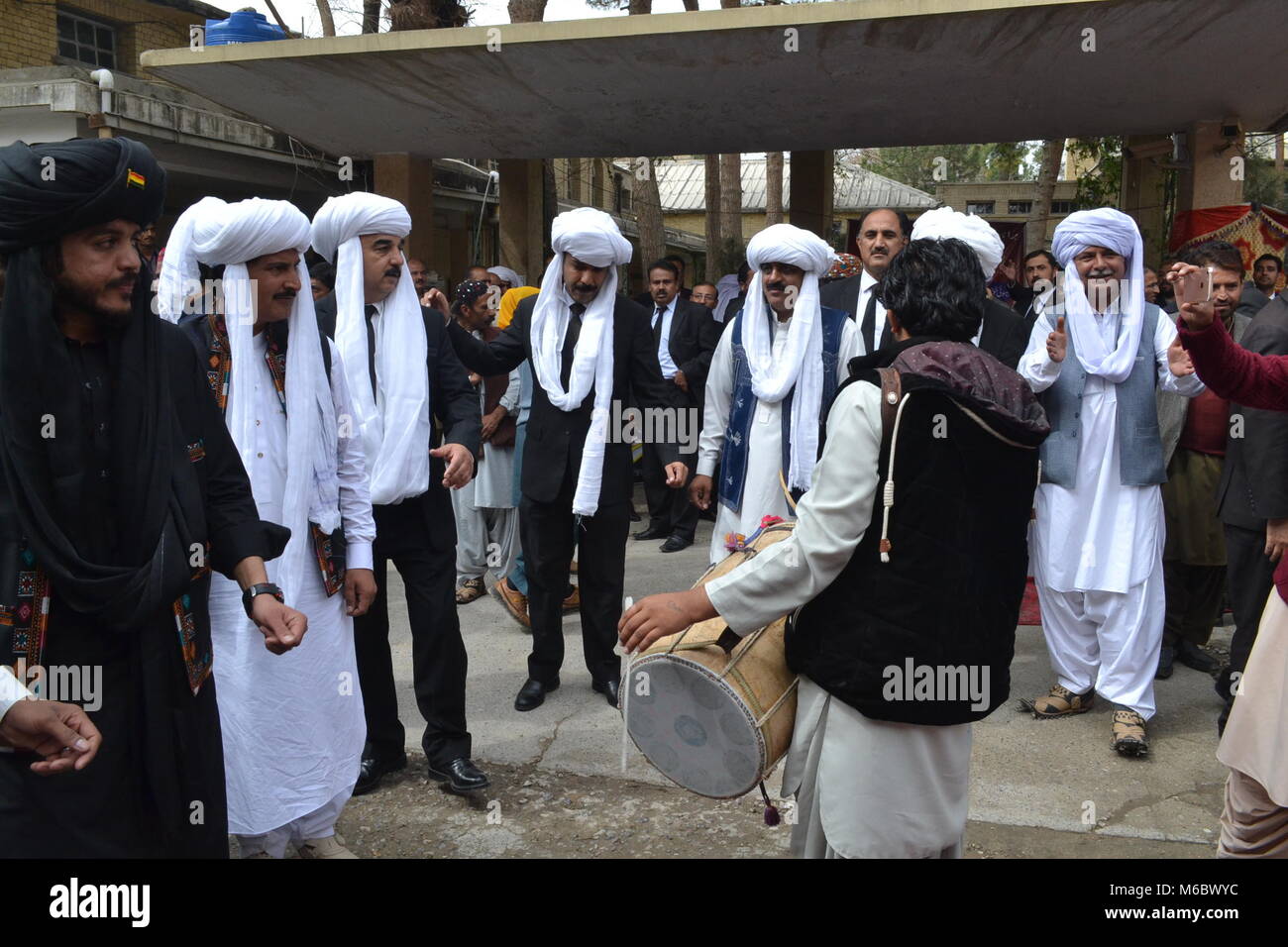 Quetta, Pakistan. 02nd Mar, 2018. People wear traditional Balochi Dress ...