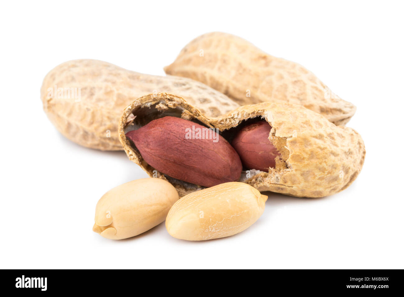 Peanuts isolated on the white background. Close up Stock Photo - Alamy