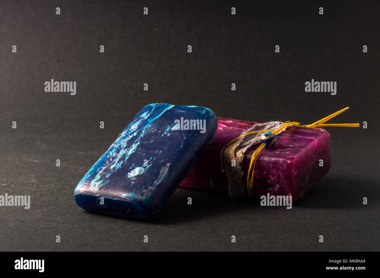 Blue and purple handmade soaps Stock Photo - Alamy