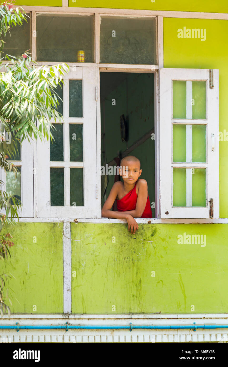 Young students looking out window hi-res stock photography and images ...