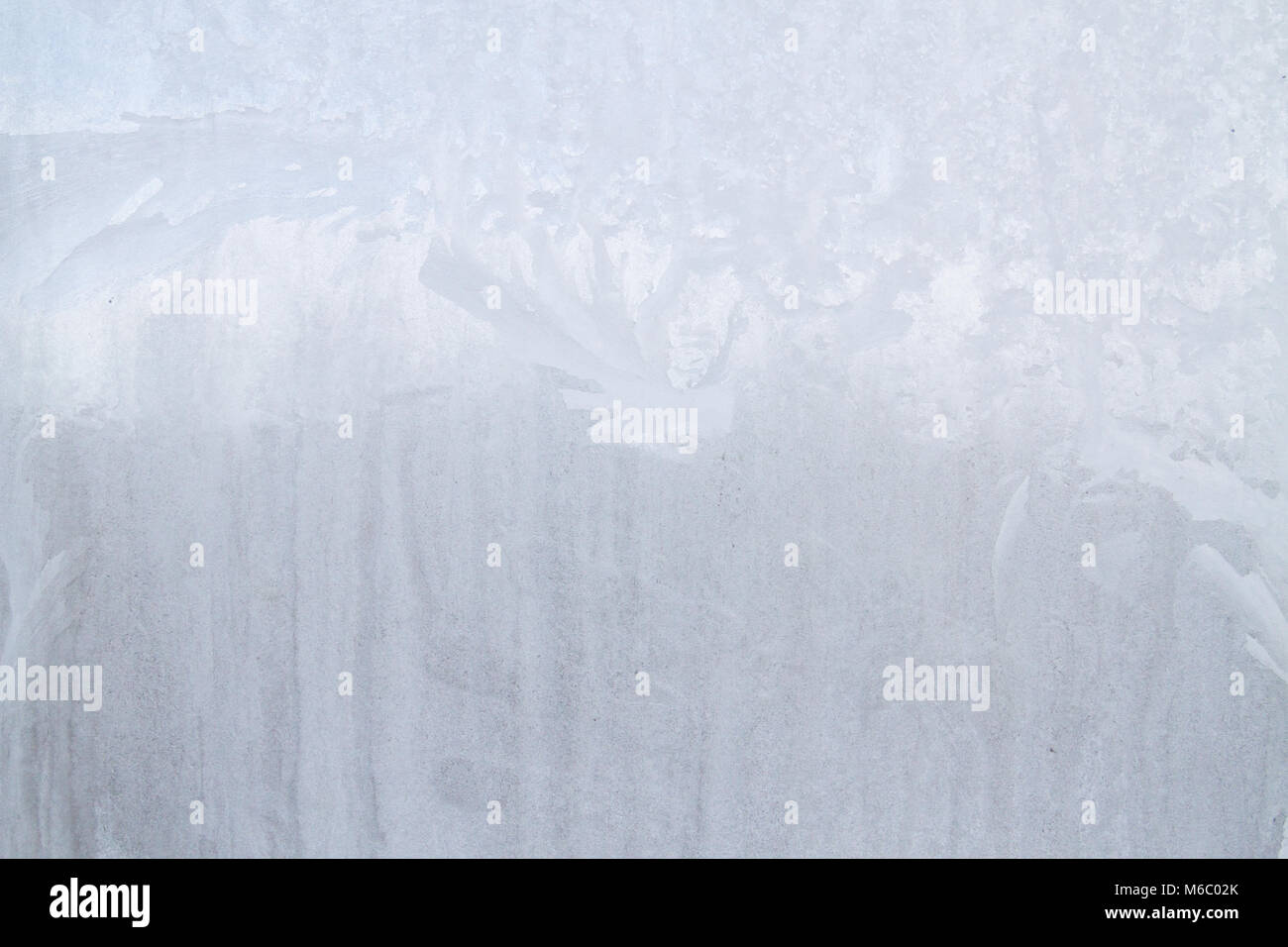 Winter frosty patterns on the frozen ice window Stock Photo - Alamy
