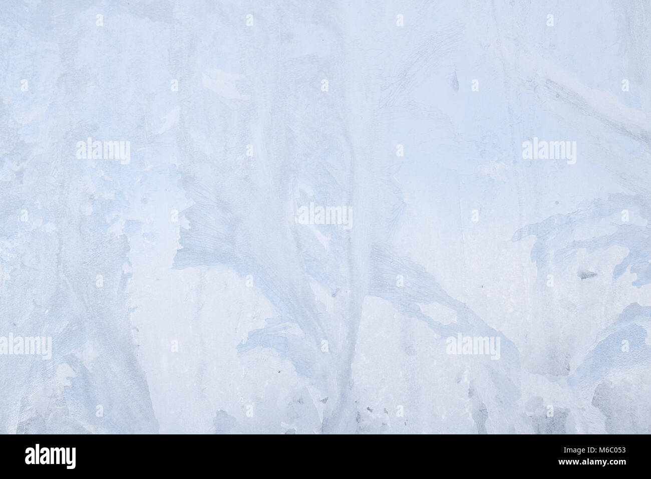 Winter frosty patterns on the frozen ice window Stock Photo - Alamy