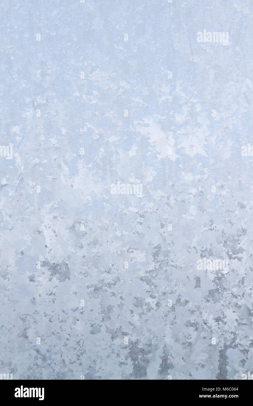 Winter frosty patterns on the frozen ice window Stock Photo - Alamy