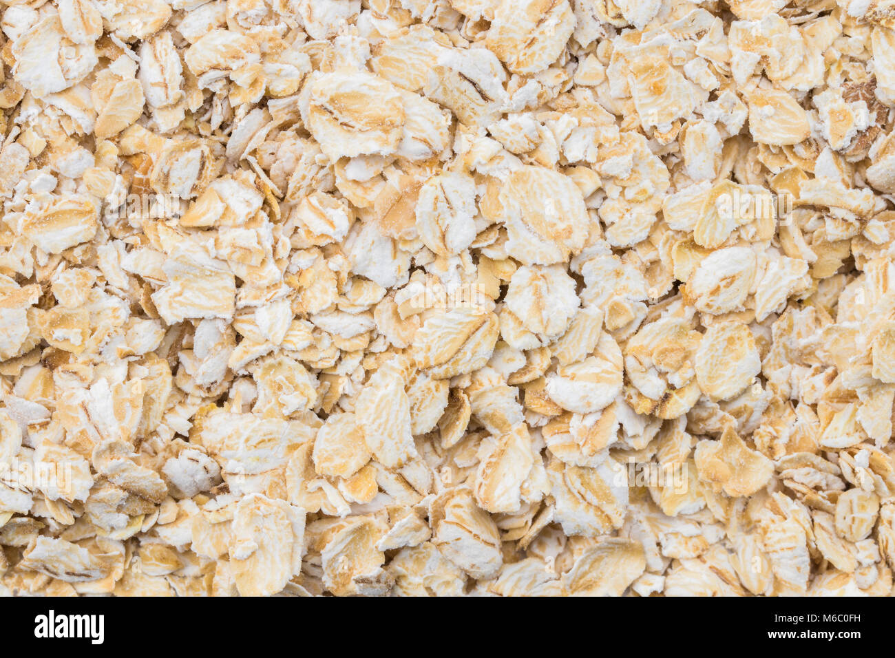 texture background Heap of rolled oats. Closeup. Top view Stock Photo ...