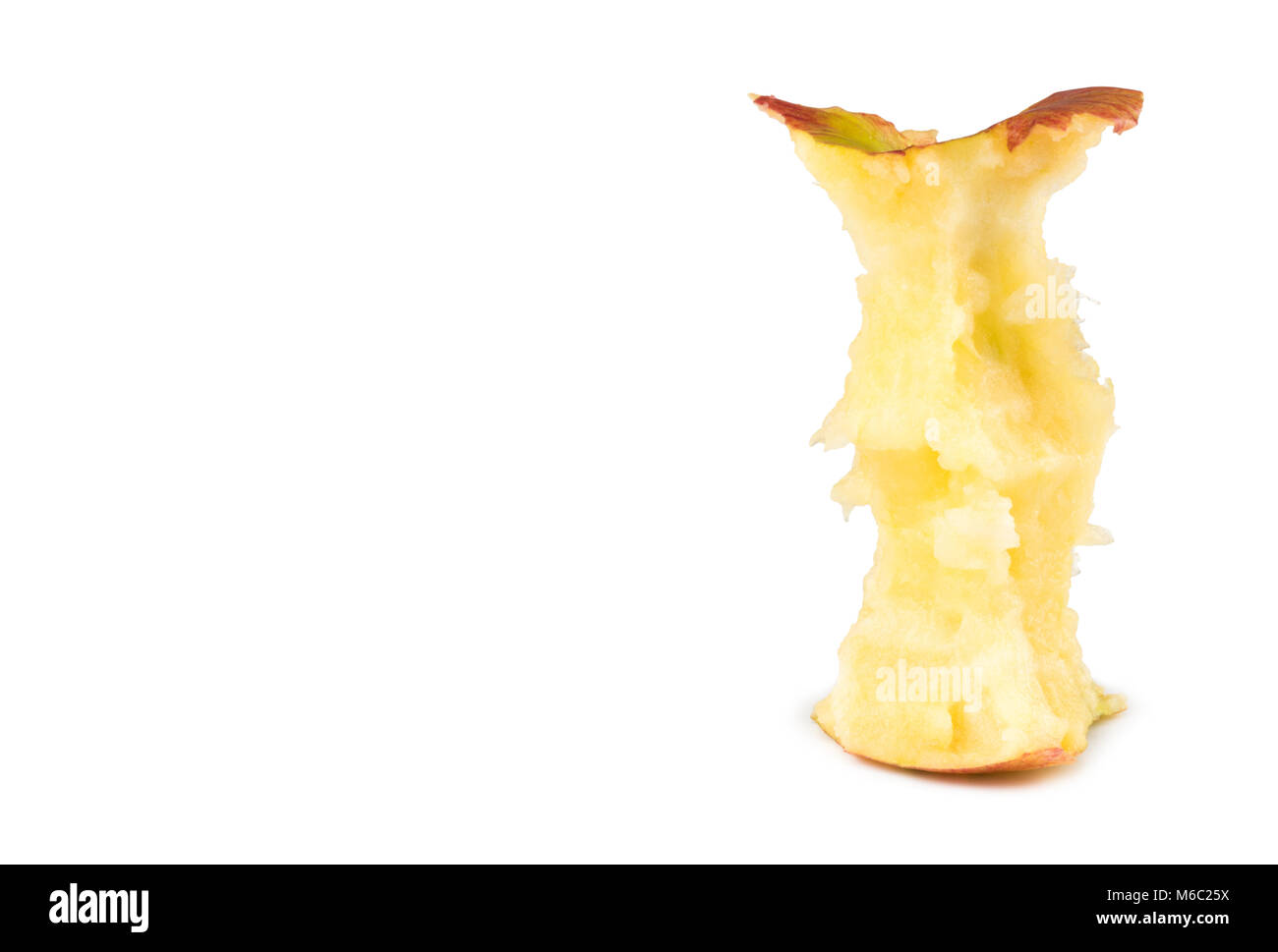 Bit of an apple. A white background Stock Photo - Alamy