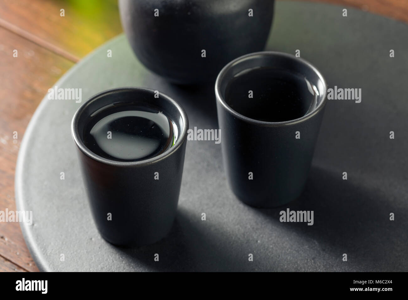 Alcoholic Japanese Sake Rice Wine in a Ceramic Glass Stock Photo - Alamy