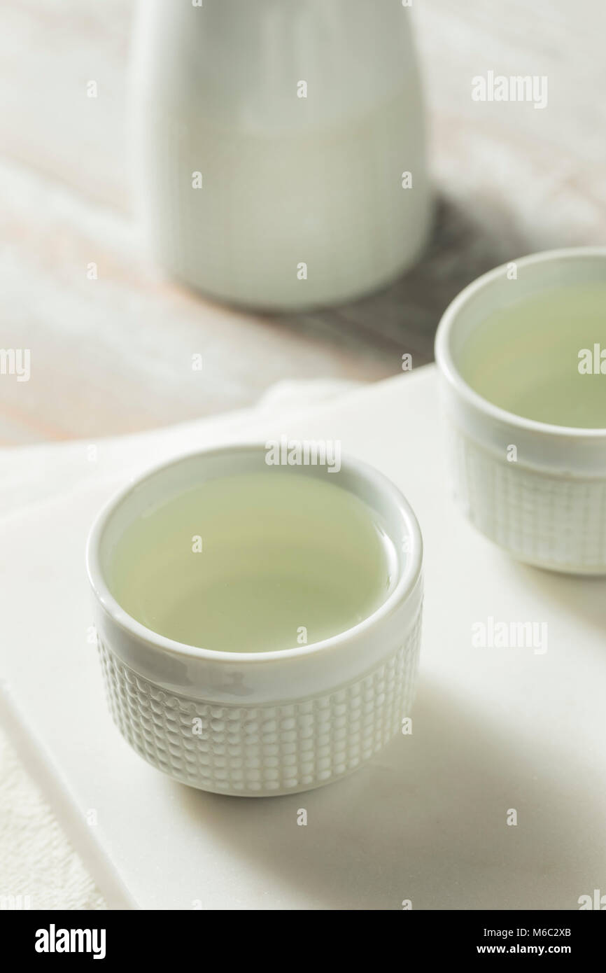 Alcoholic Japanese Sake Rice Wine in a Ceramic Glass Stock Photo - Alamy