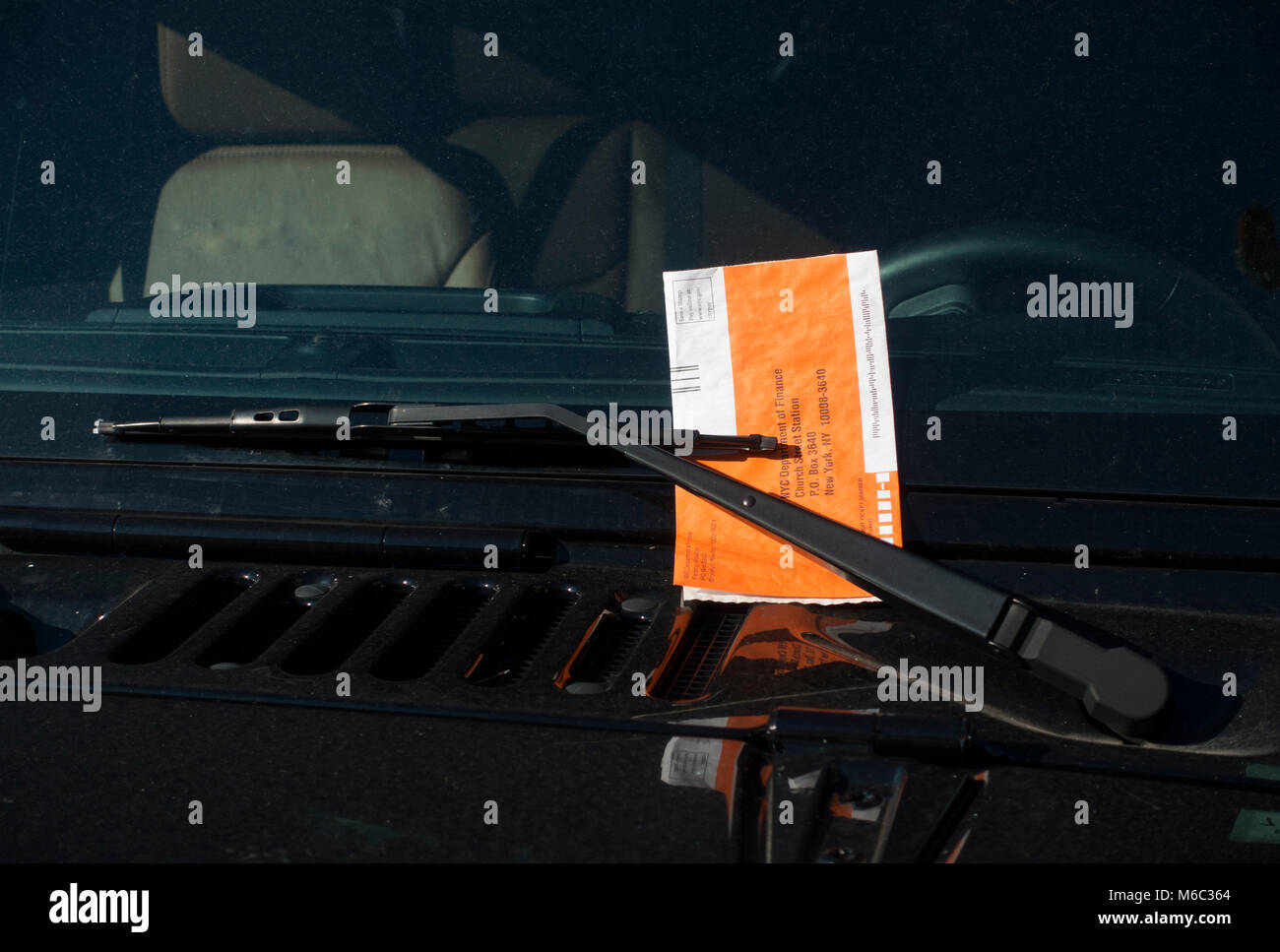 parking ticket on car windshield Brooklyn NYC Stock Photo - Alamy
