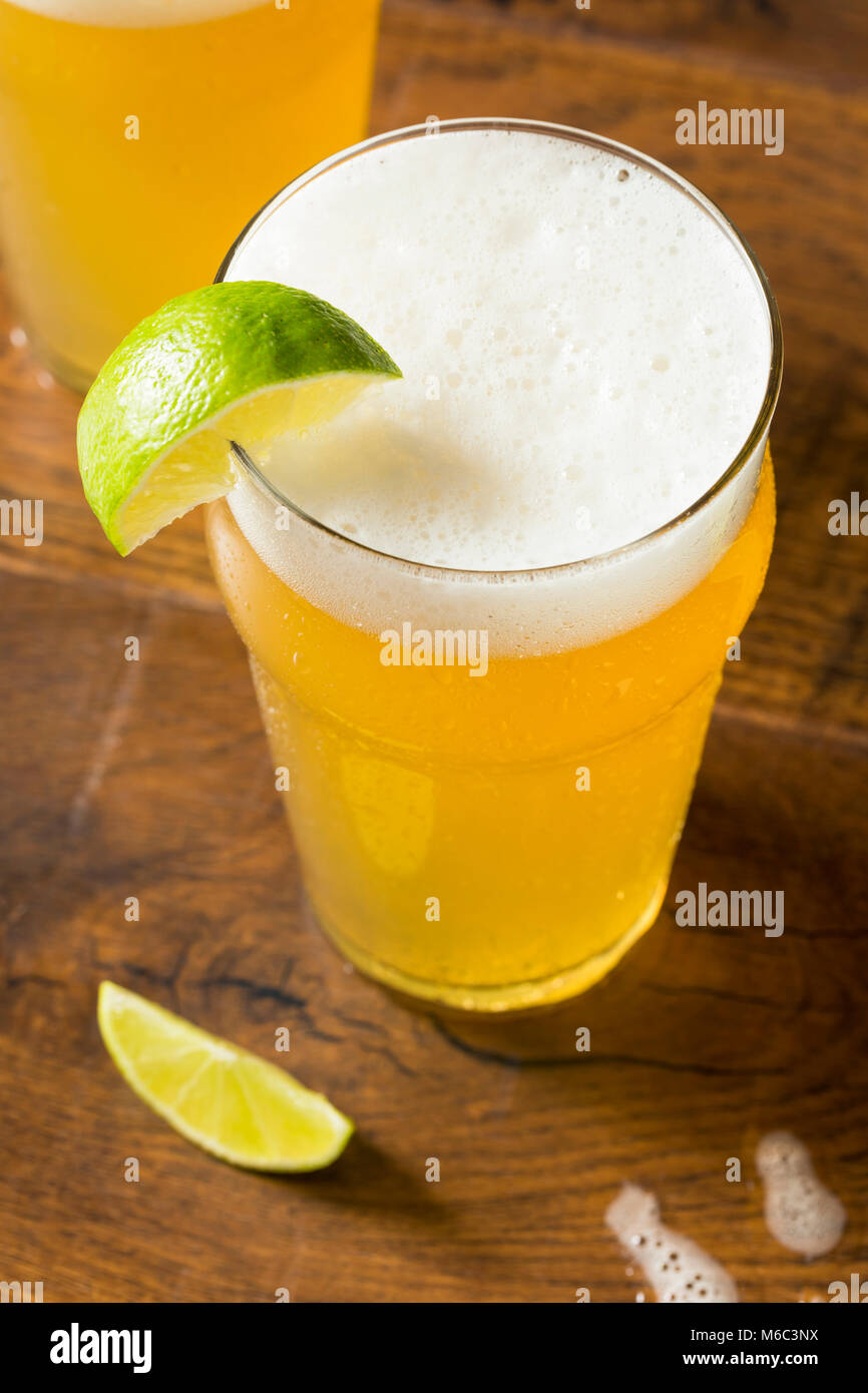 Alcoholic Refreshing Mexican Beer with Lime in a Pint Glass Stock Photo ...