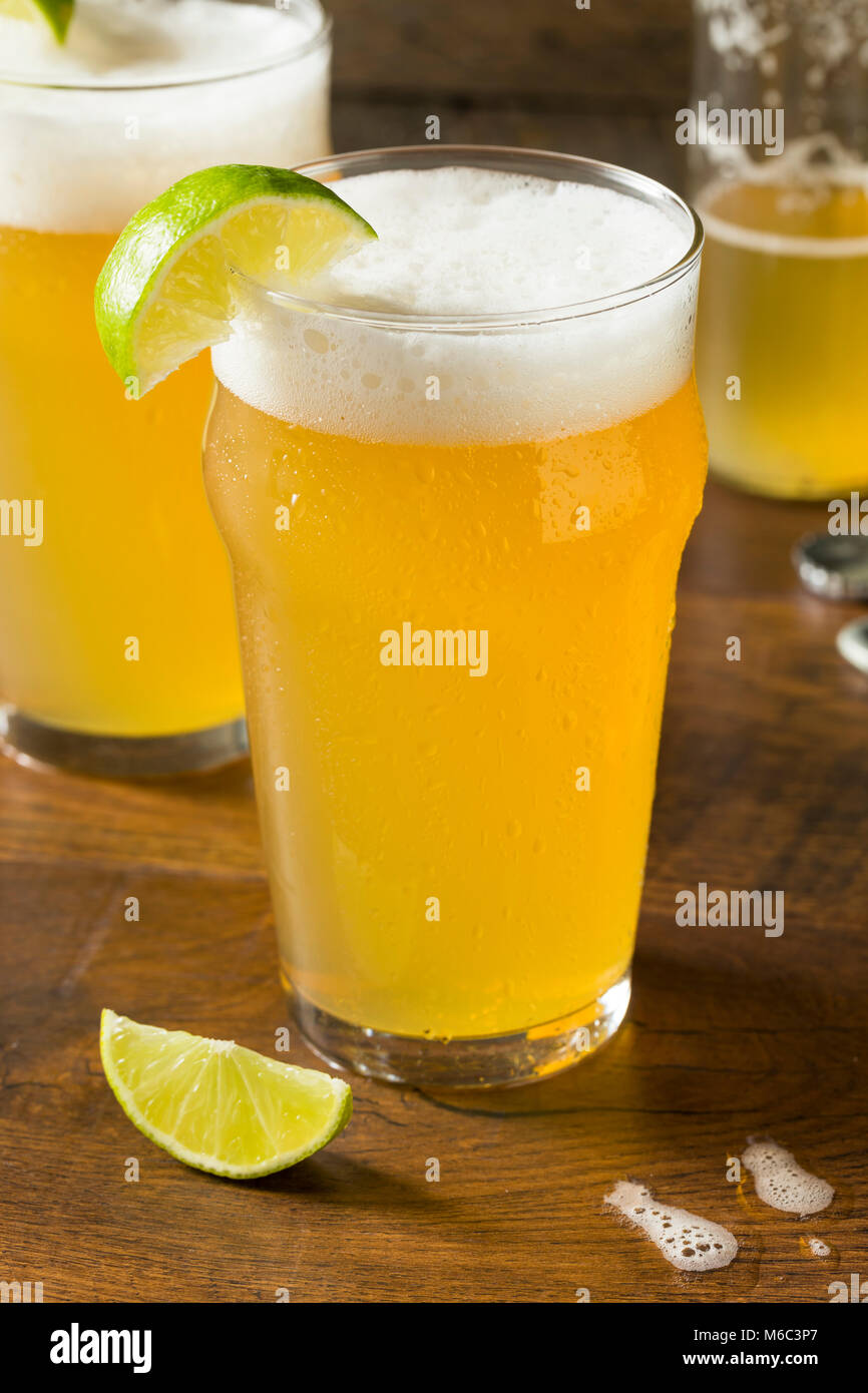 Alcoholic Refreshing Mexican Beer with Lime in a Pint Glass Stock Photo ...