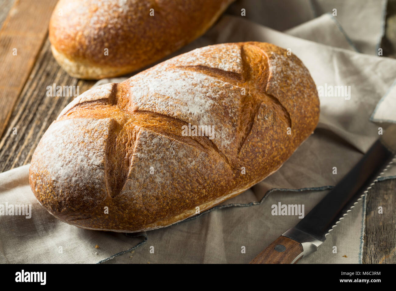 Whole Grain White French Bread Cut into Slices Stock Photo - Alamy