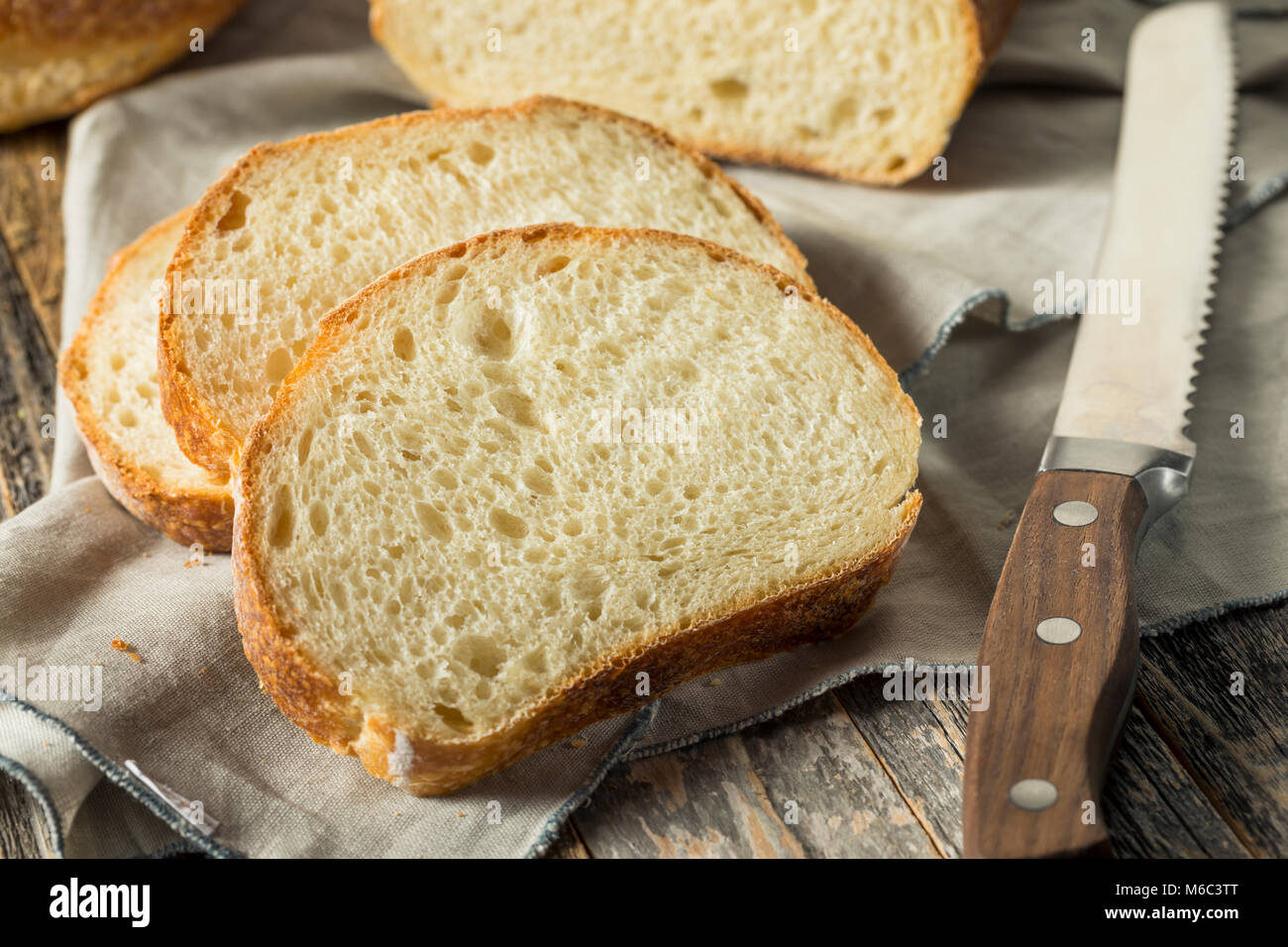 Whole Grain White French Bread Cut into Slices Stock Photo - Alamy