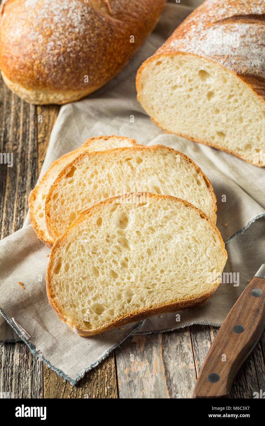 Whole Grain White French Bread Cut into Slices Stock Photo - Alamy