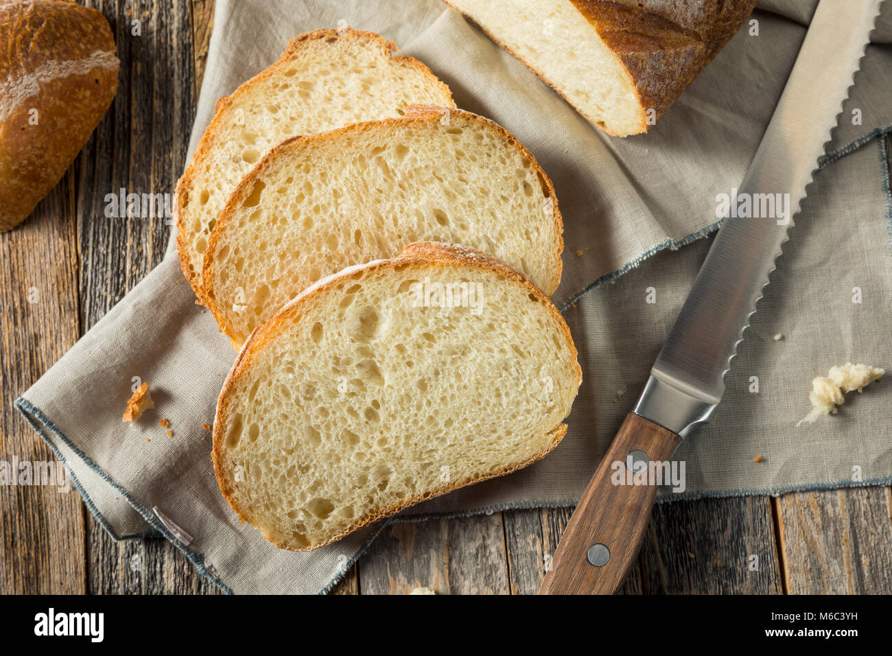 Whole Grain White French Bread Cut into Slices Stock Photo - Alamy