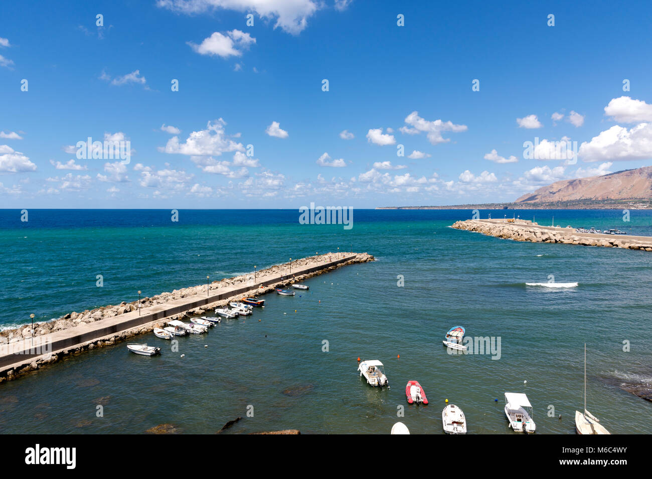 crystal clear sea and frothy waves on the beaches of Palermo in Sicily ...