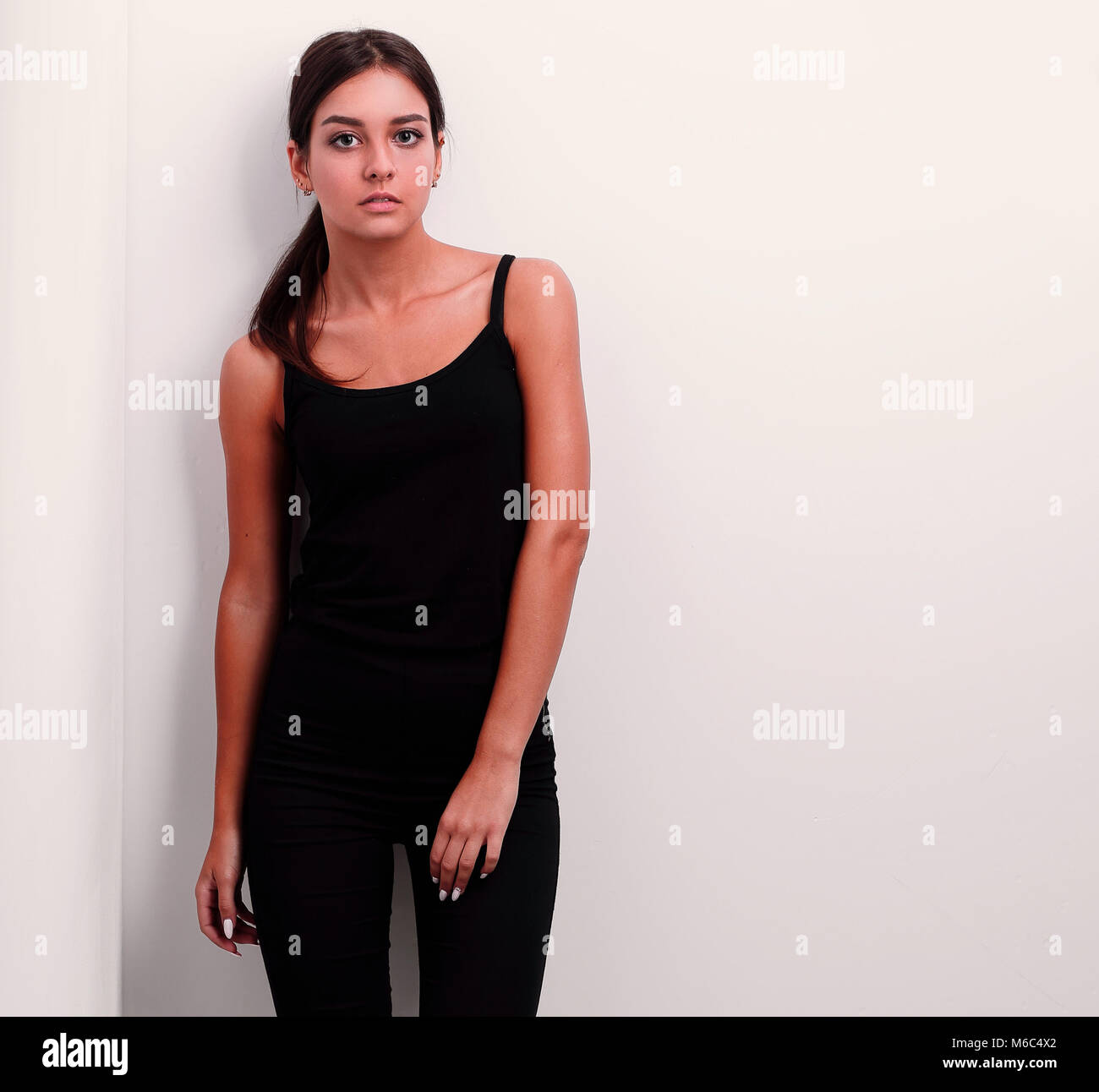 pensive young woman walking forward Stock Photo - Alamy