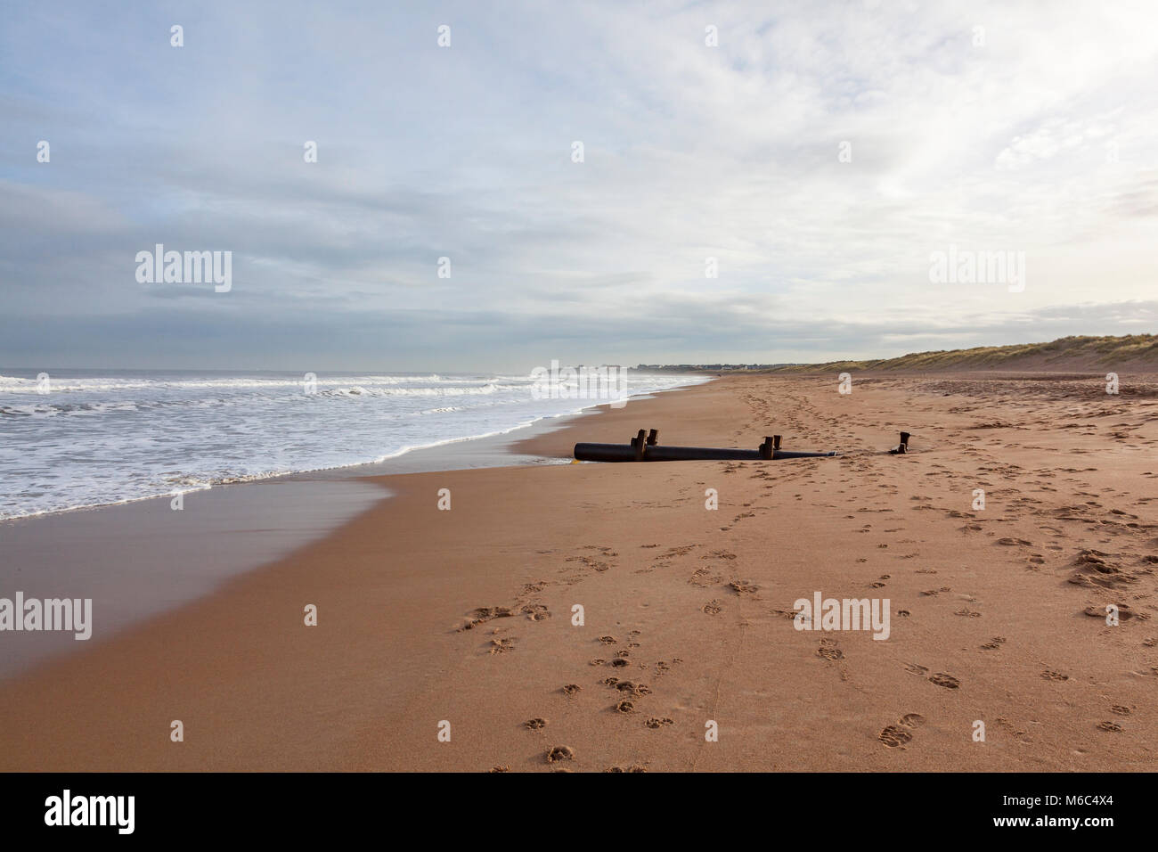 A view along Blyth sandy beach on a cold and windy day the North Sea ...