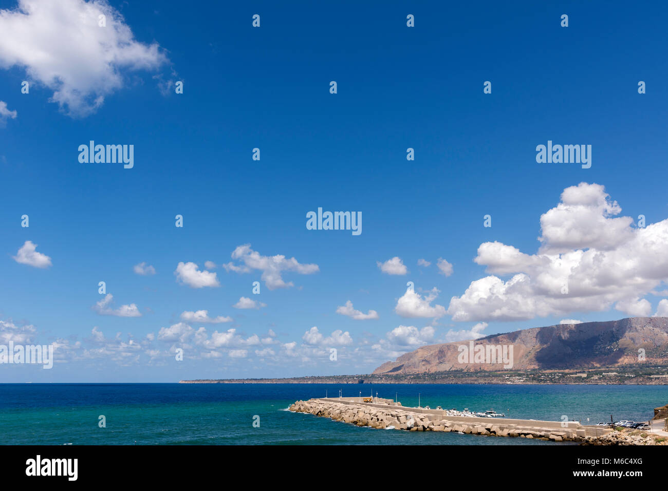 crystal clear sea and frothy waves on the beaches of Palermo in Sicily ...