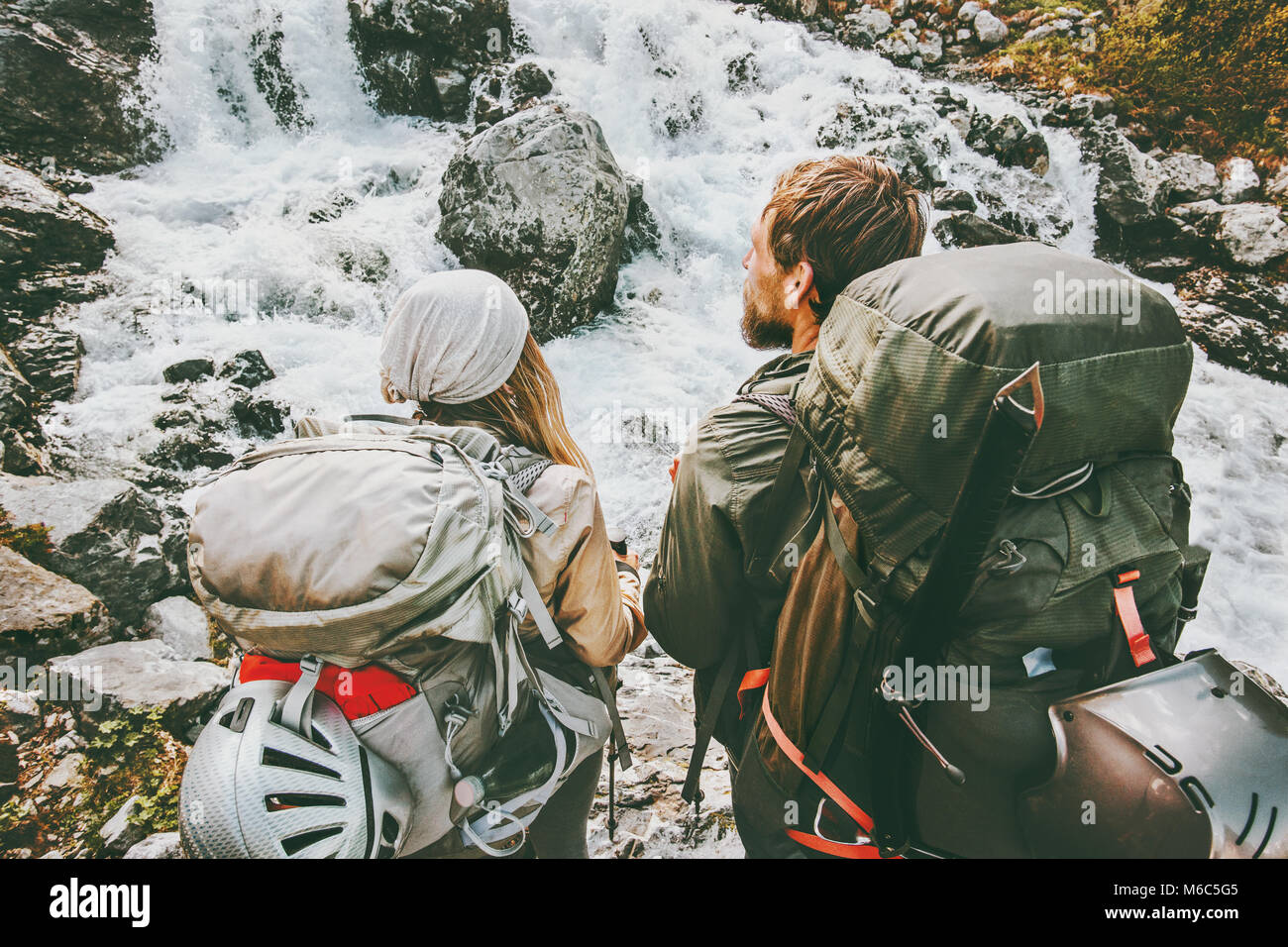 Couple backpackers hiking in mountains together love and Travel ...