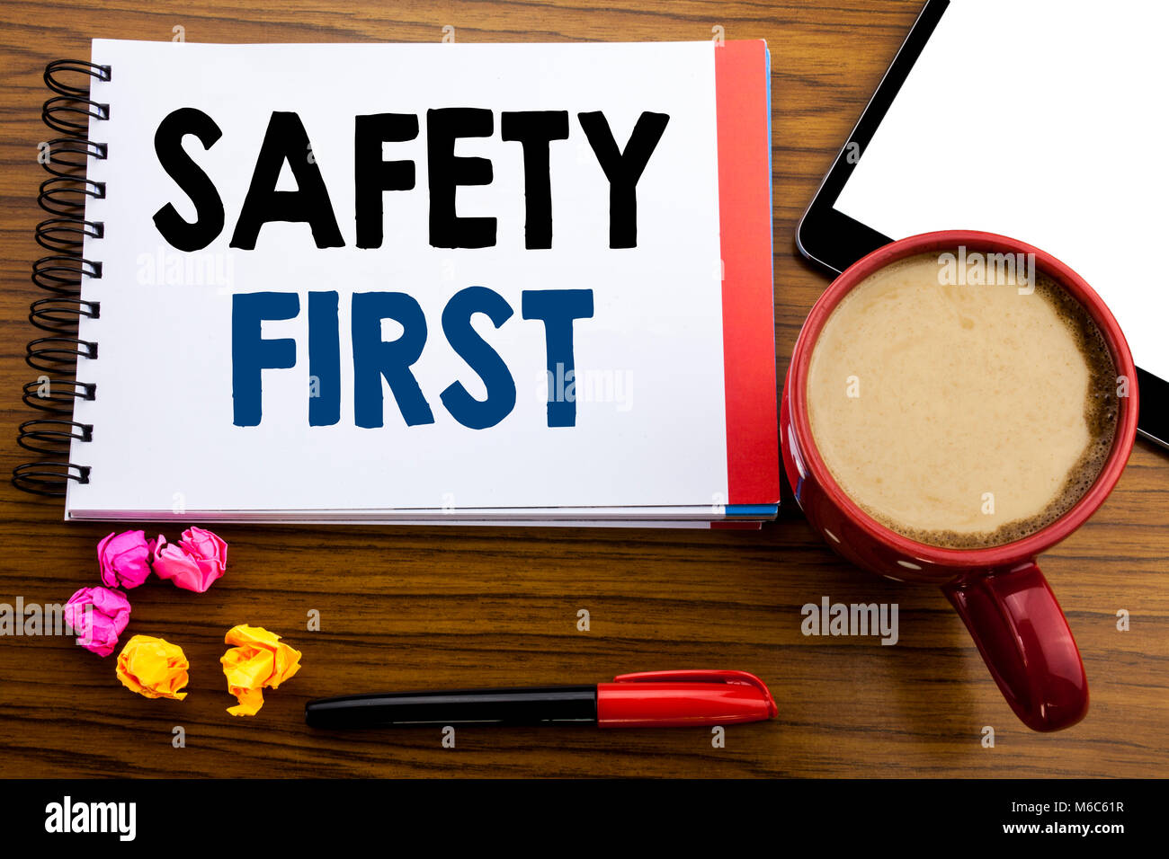 Handwritten text showing Safety First. Business concept writing Safe ...