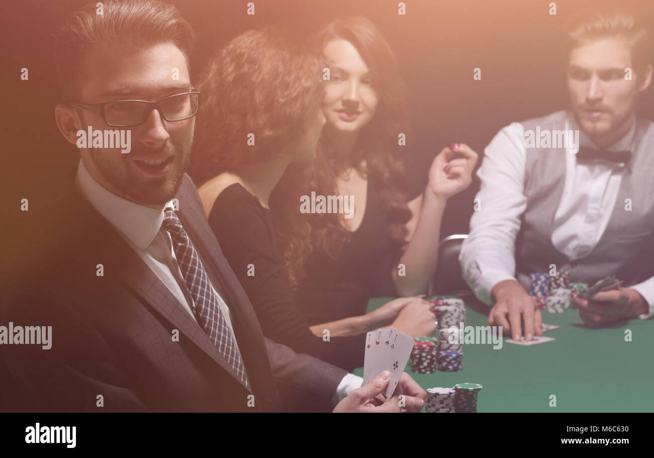 Modern businessman playing poker hi-res stock photography and images ...