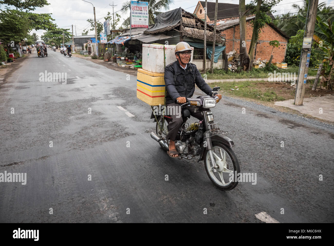Vietnamese Man Riding Motorcycle High Resolution Stock Photography and ...