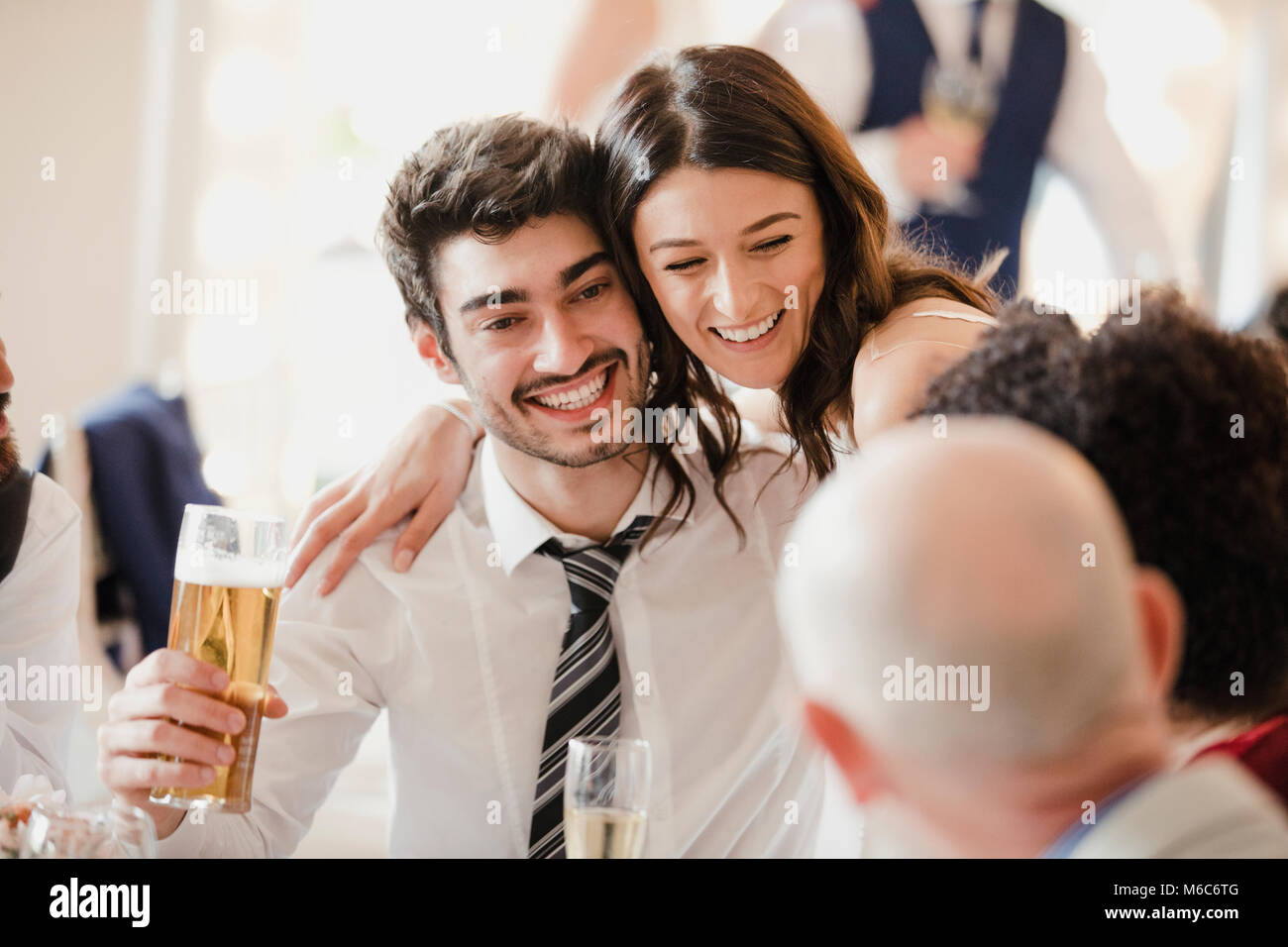 Bride is socialising with her guests on her wedding day Stock Photo - Alamy