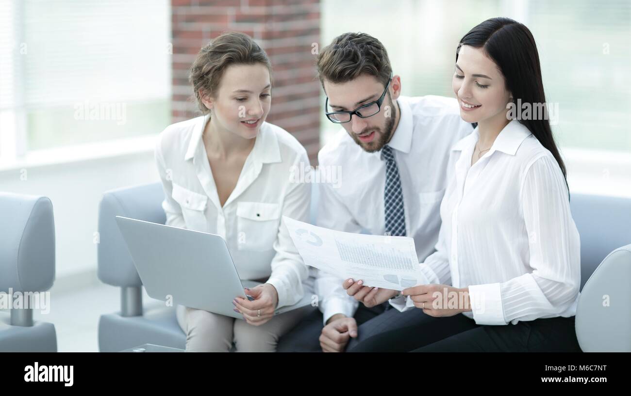 business team working with financial charts in the office Stock Photo ...