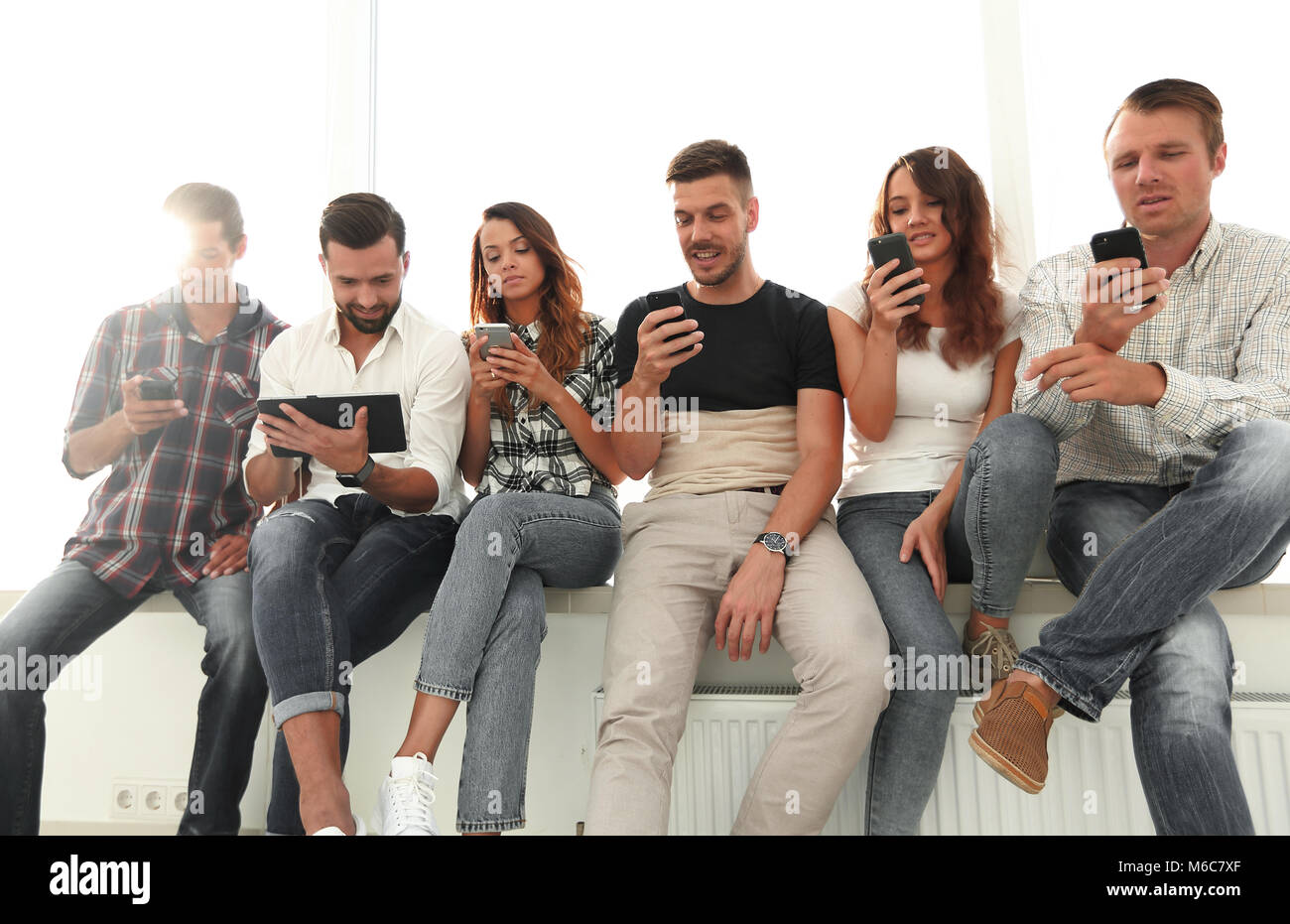 Employee using gadgets laptop hi-res stock photography and images - Alamy