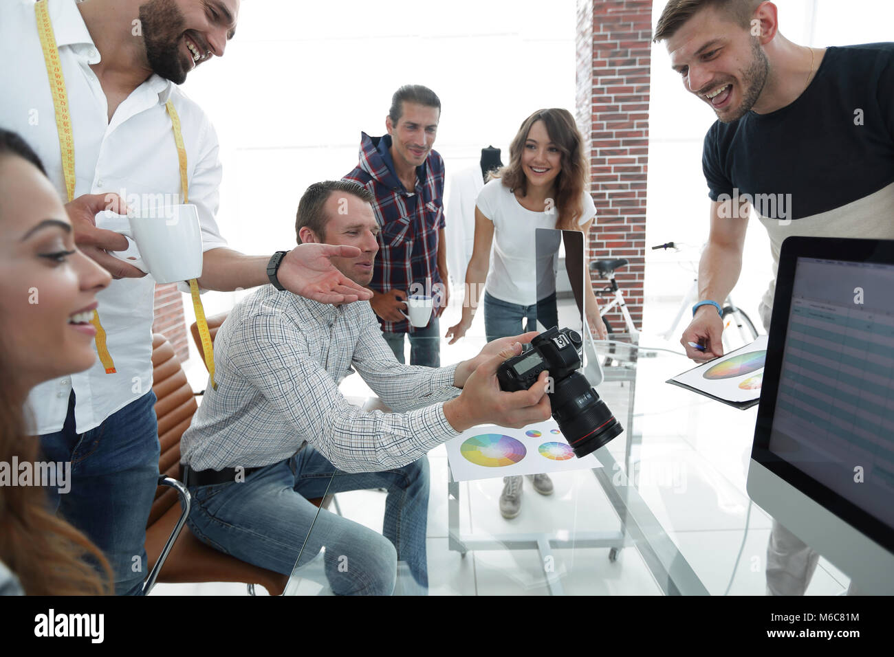 group photo of editors working in a modern office Stock Photo - Alamy