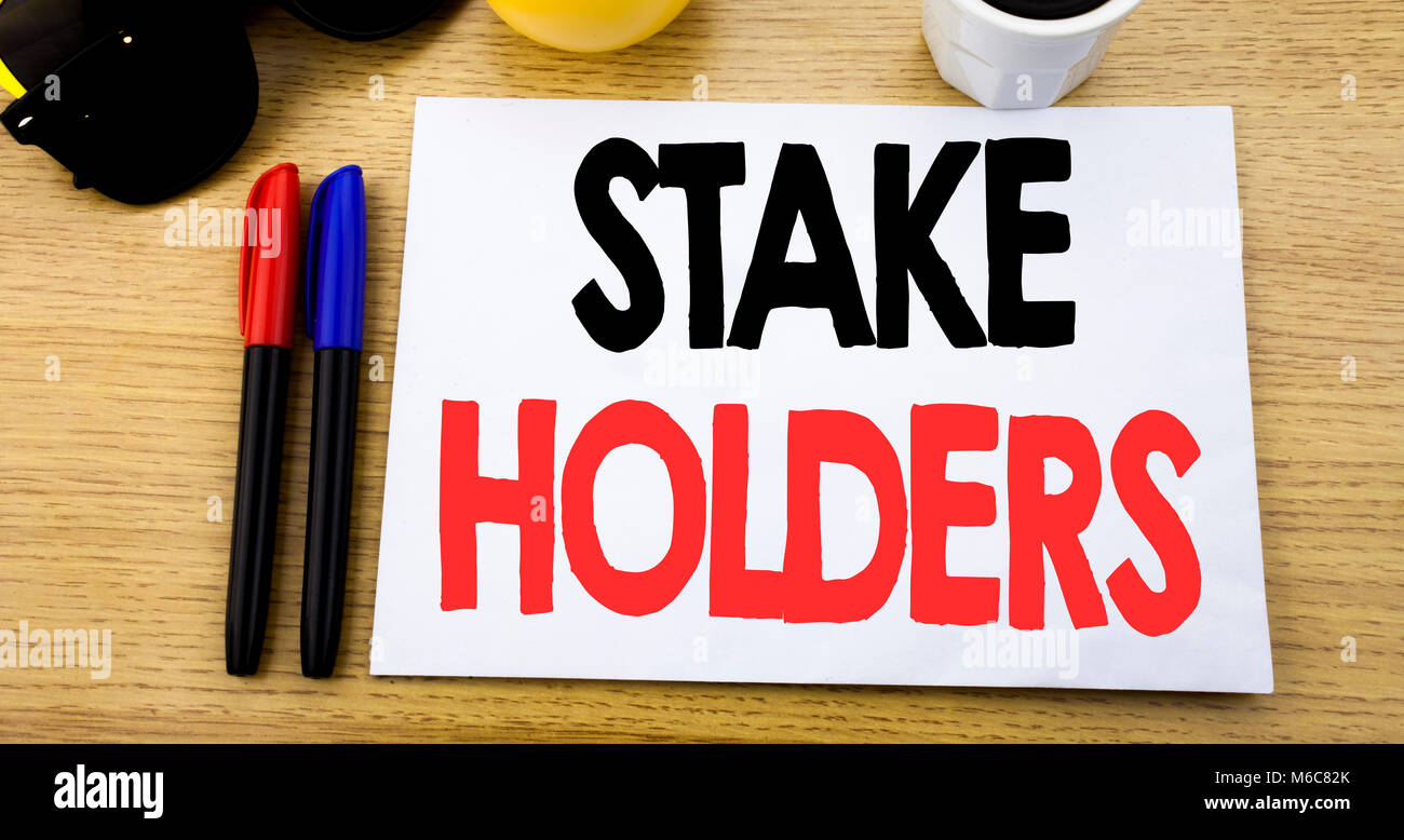Handwritten text caption showing Stake Holders. Business concept ...