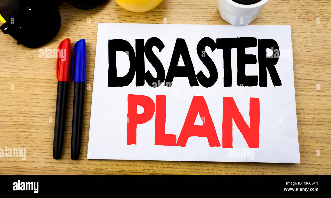 Handwritten text caption showing Disaster Plan. Business concept ...