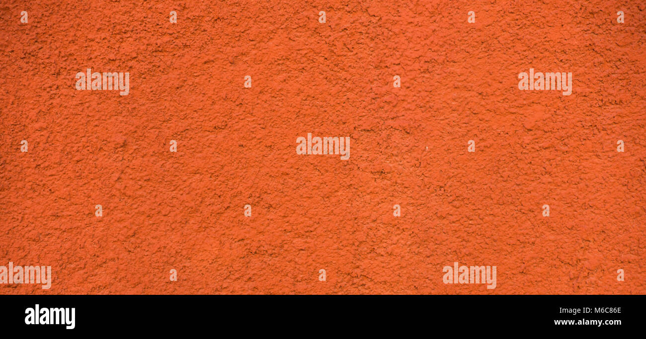 Orange color concrete wall texture background Stock Photo - Alamy