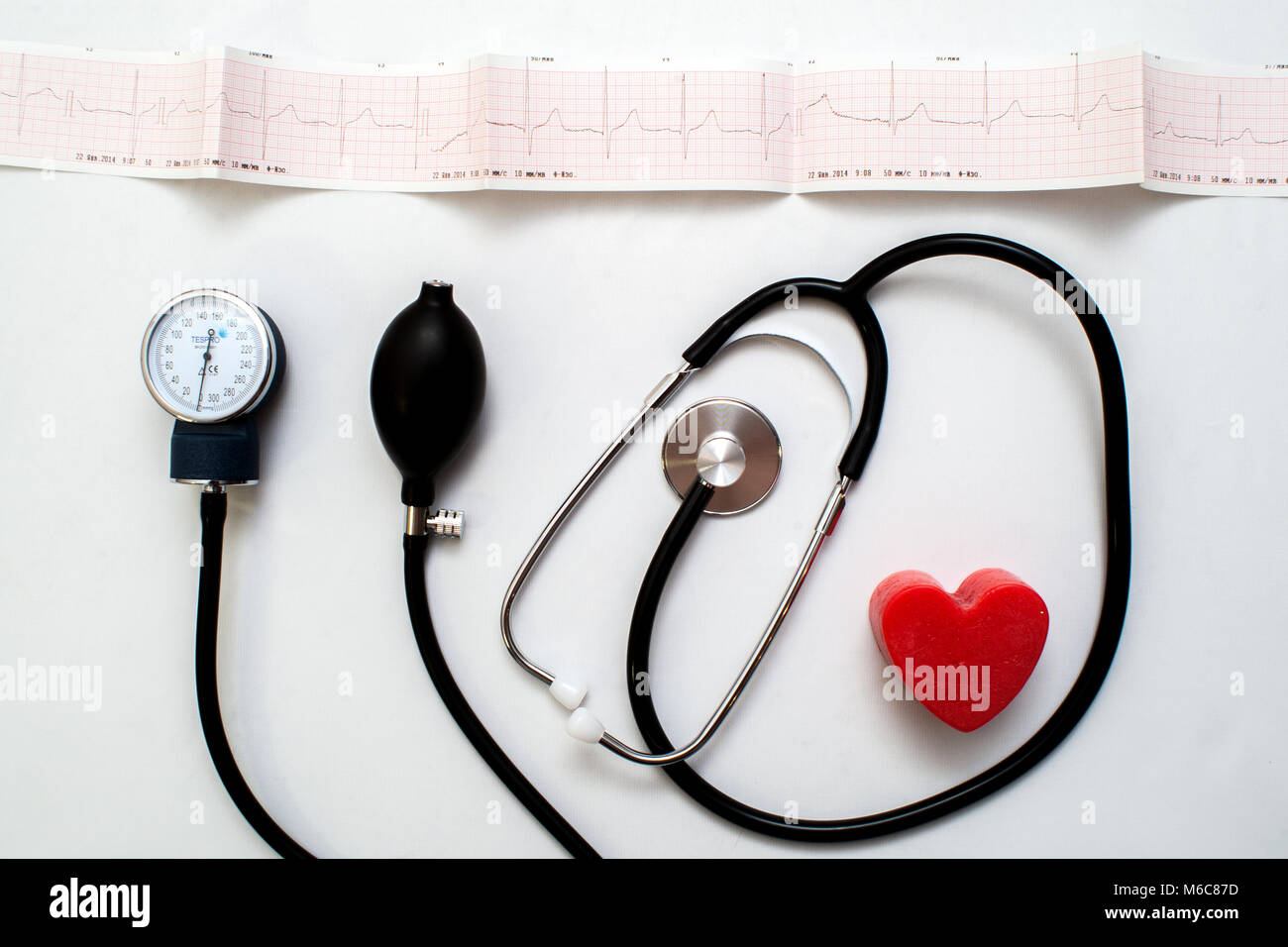 Red heart and a stethoscope on desk cardiac, closeup Stock Photo - Alamy