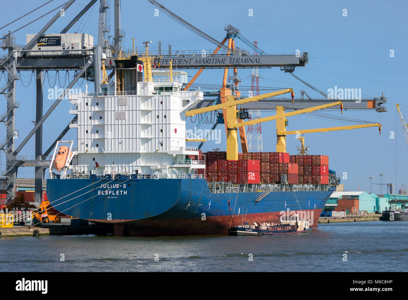 ANTWERP, BELGIUM - JUL 9, 2013: Container ships moored at a Independent ...