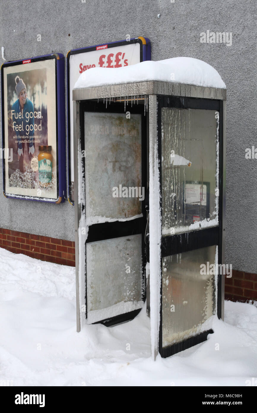 a snow covered telephone box Stock Photo - Alamy