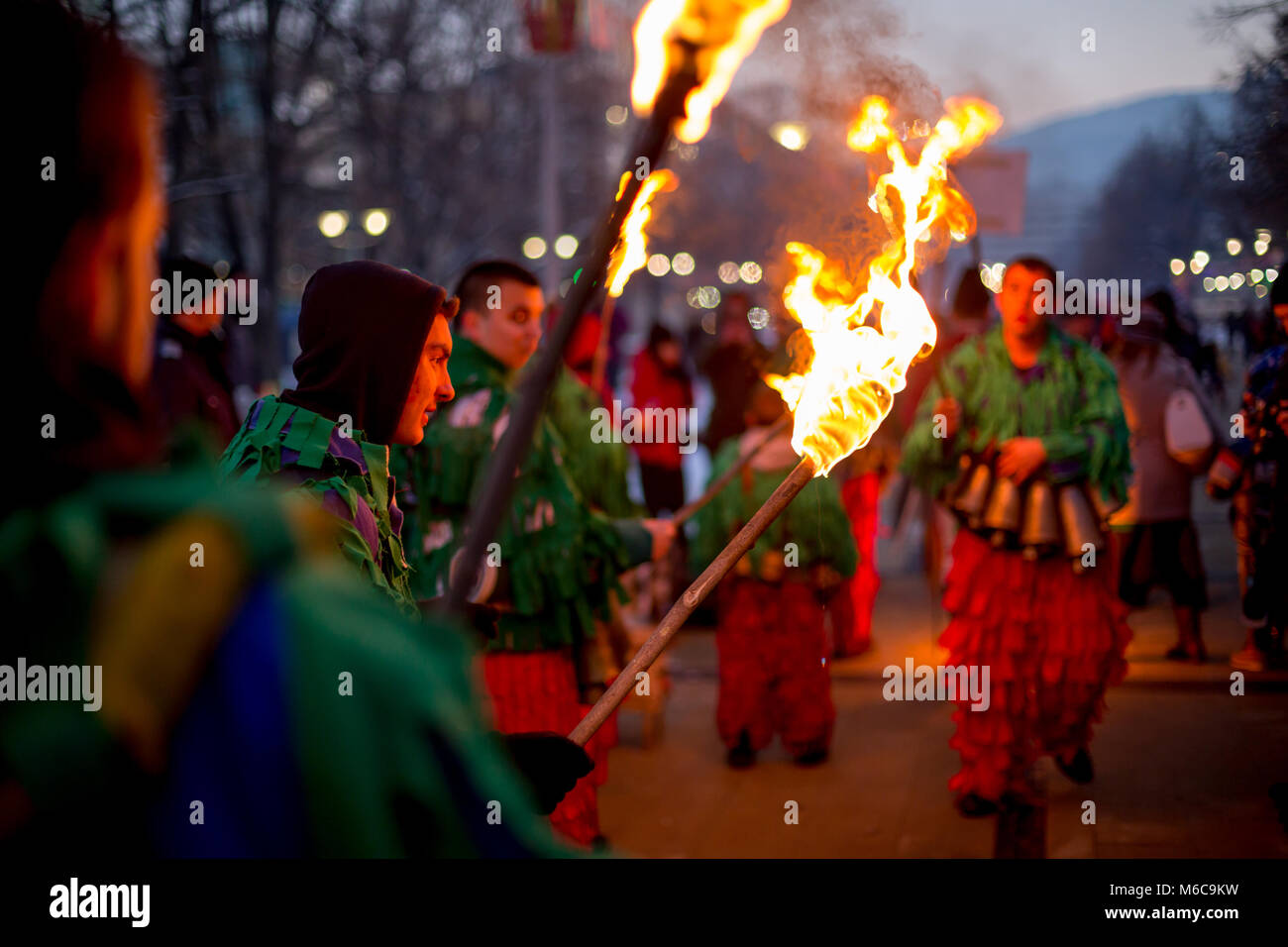 Enjoying the magic of fire of the ritual torch Stock Photo - Alamy