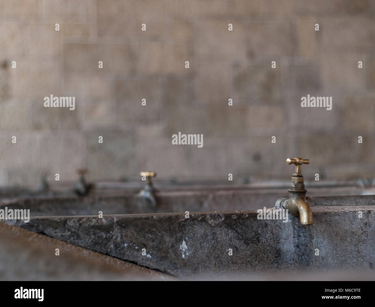 Communal water tap hi-res stock photography and images - Alamy
