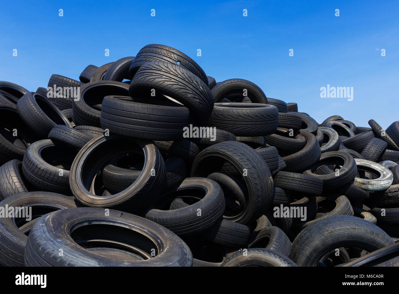 heap of old and worn car tires Stock Photo - Alamy