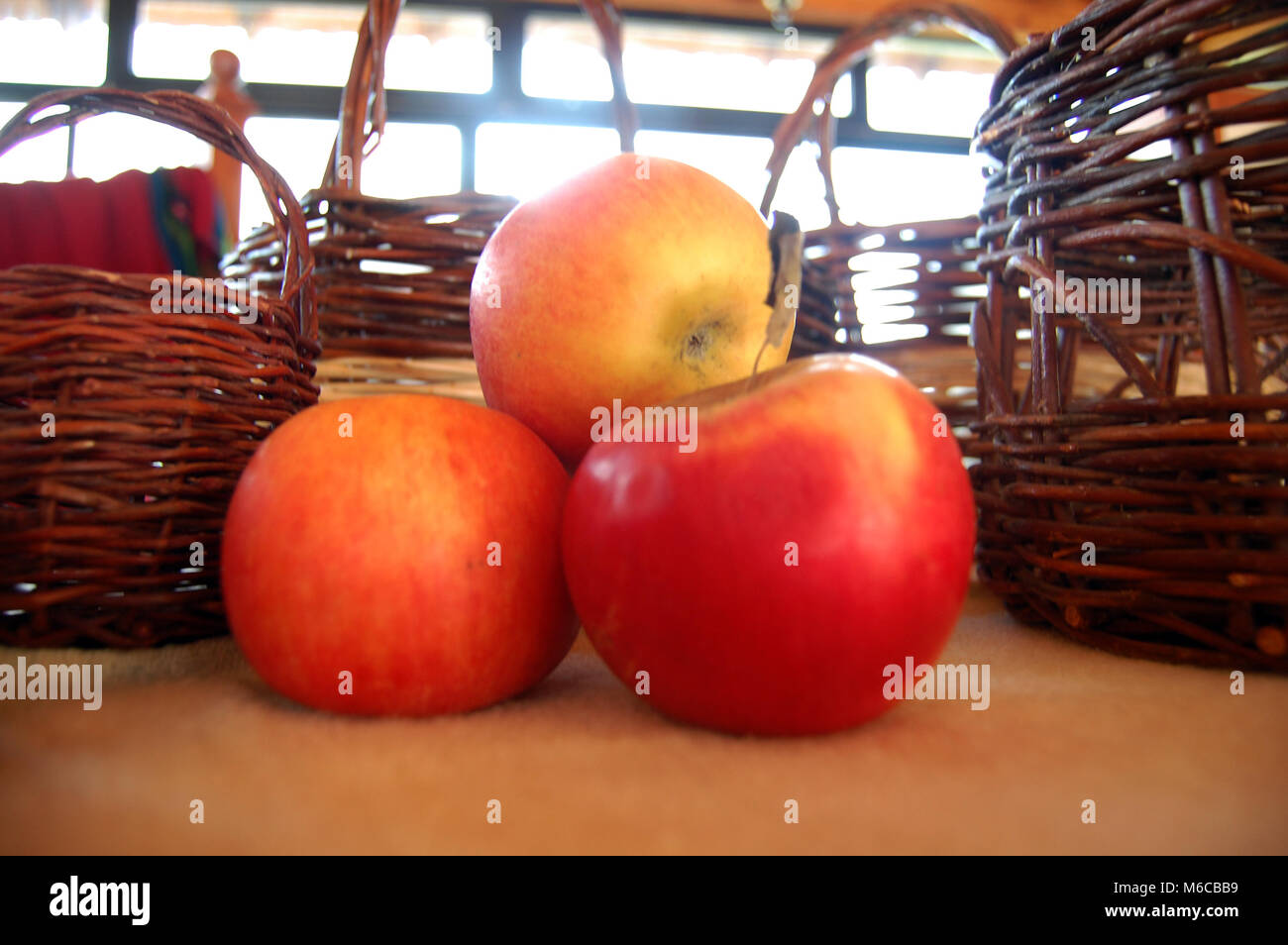 Picture of a Red apples out of basket Stock Photo - Alamy