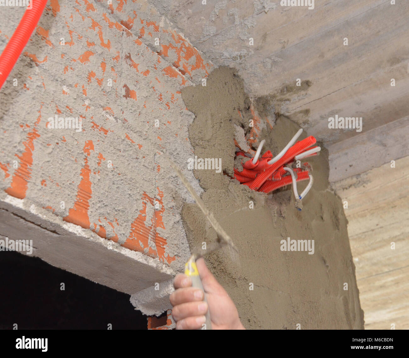 Piocture of a Installing power outlets. Power sockets on initial stage ...