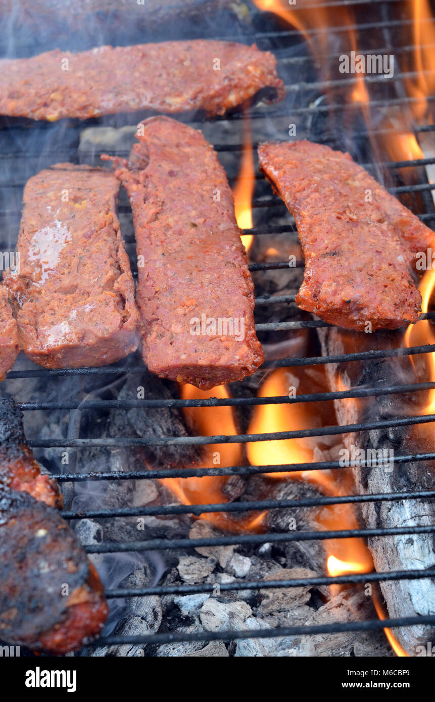 Picture of a Fat Sausage on a grill, Food concept Stock Photo - Alamy