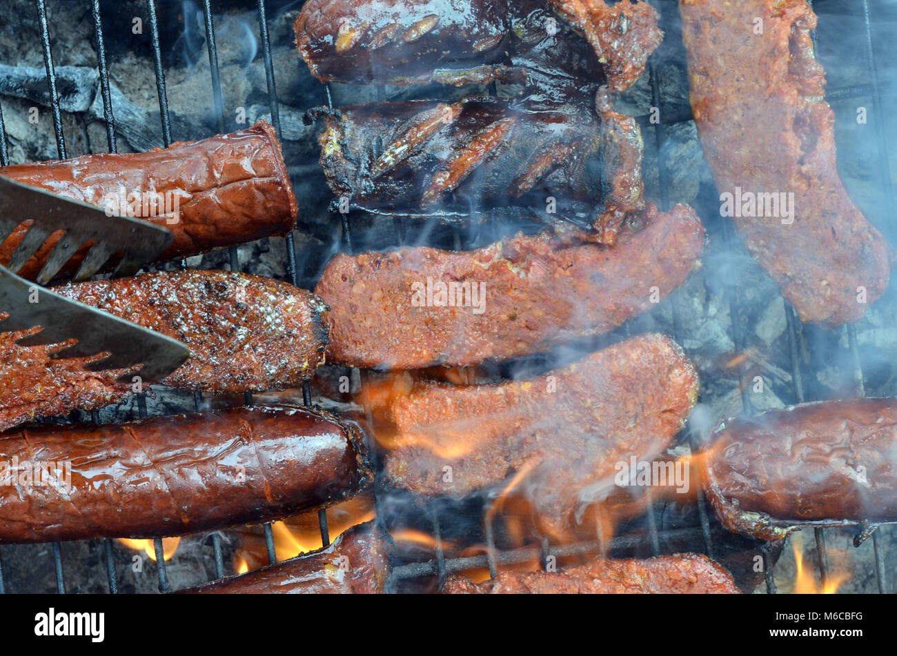 Picture of a Fat Sausage on a grill, Food concept Stock Photo - Alamy
