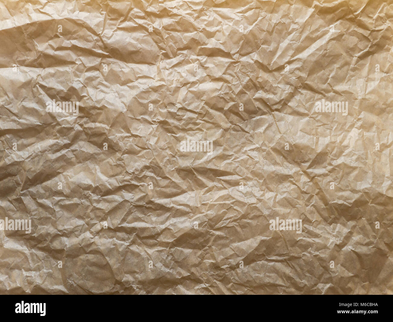 Crumpled brown waxed packing paper texture Stock Photo - Alamy
